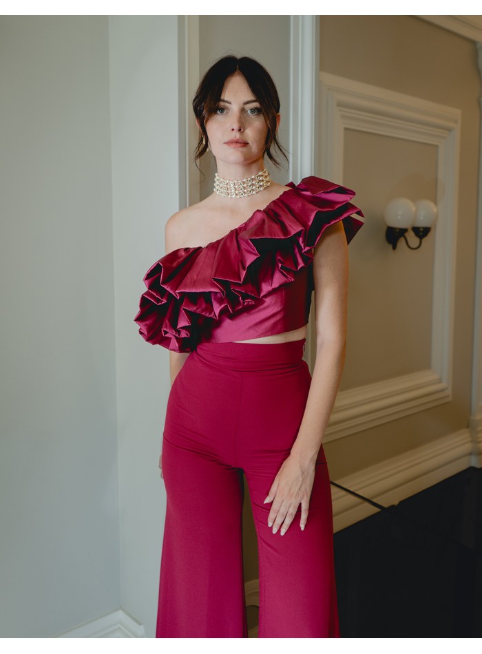Asymmetrical top with ruffle with matching pants set | INVITADISIMA